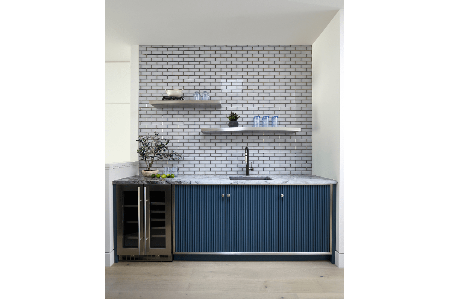 Bold Blue Wet Bar with Reeded Doors in Luxurious Carriage House ...